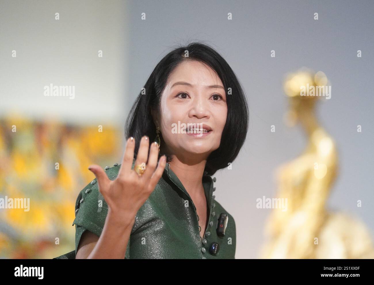 (250105) -- HONG KONG, Jan. 5, 2025 (Xinhua) -- Chinese fashion designer Guo Pei is interviewed ...