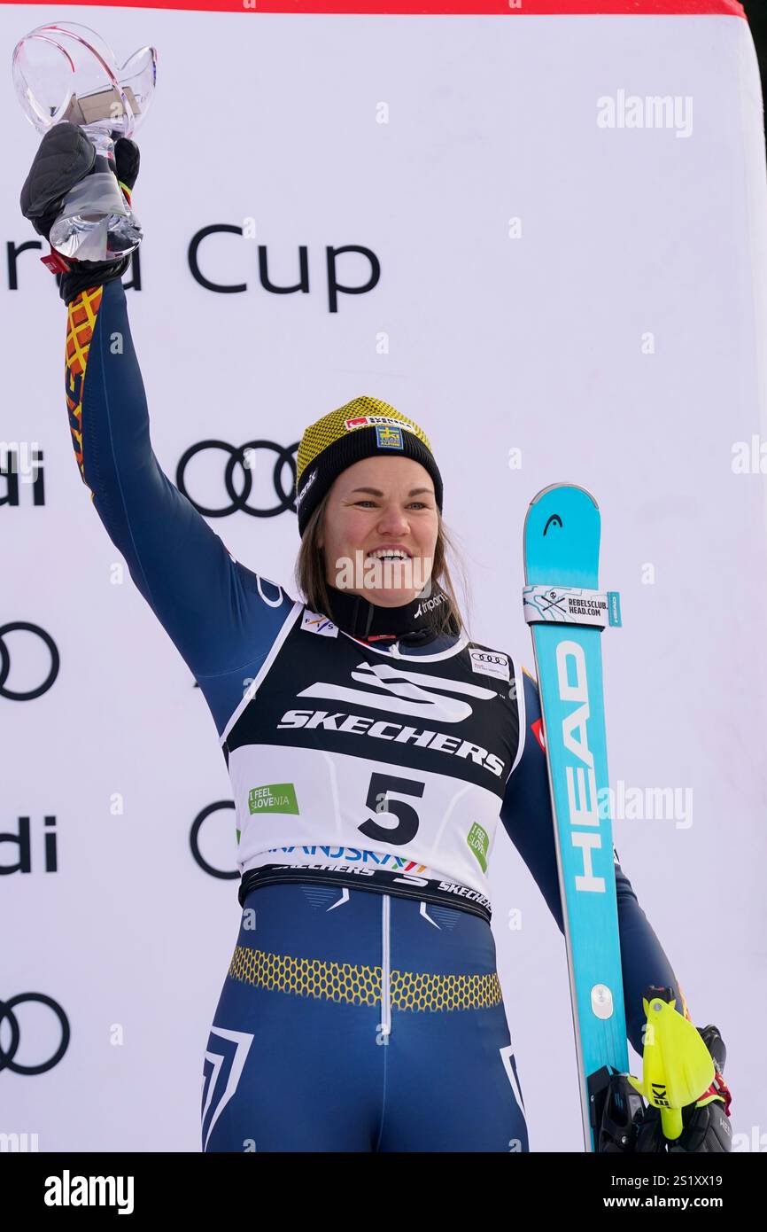 Third placed Sweden's Anna Swenn Larsson celebrates after an alpine ski ...