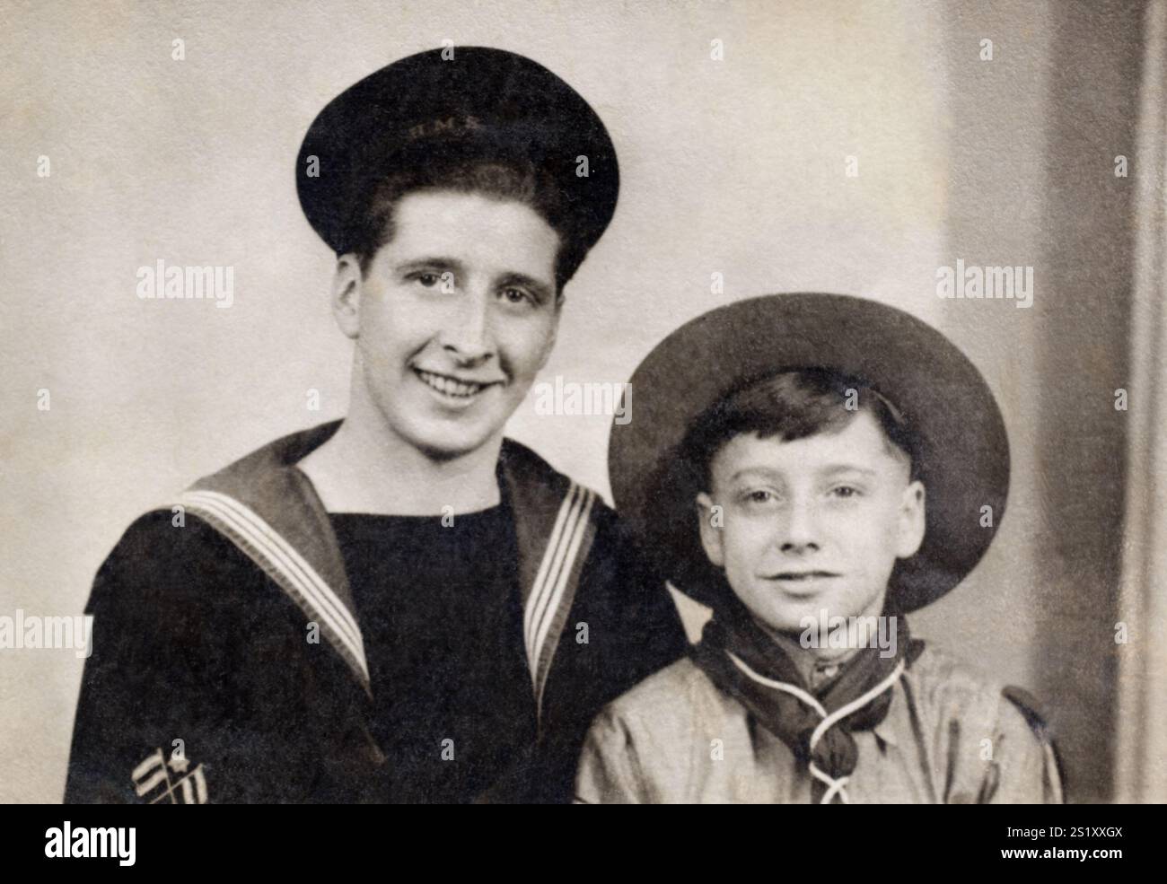 A Royal Navy signaller alongside a bou scout during the Second World ...