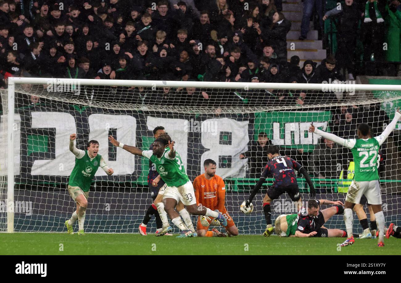 Hibernian's Rocky Bushiri celebrates scoring their side's third goal of ...