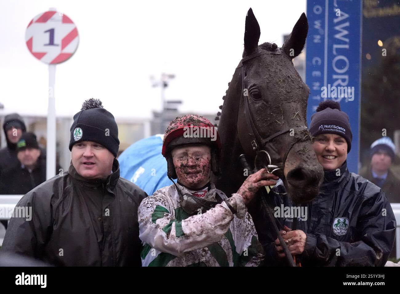 Jockey Sam Ewing and trainer Gordon Elliott after winning the Lawlor's ...