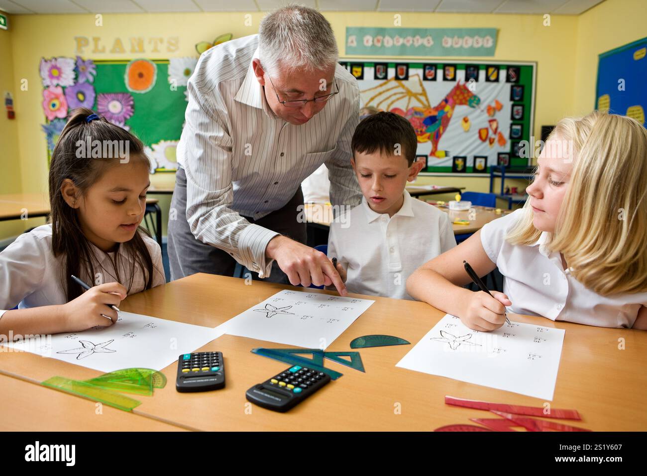 Junior School: Maths Advice. A group of young junior school children ...