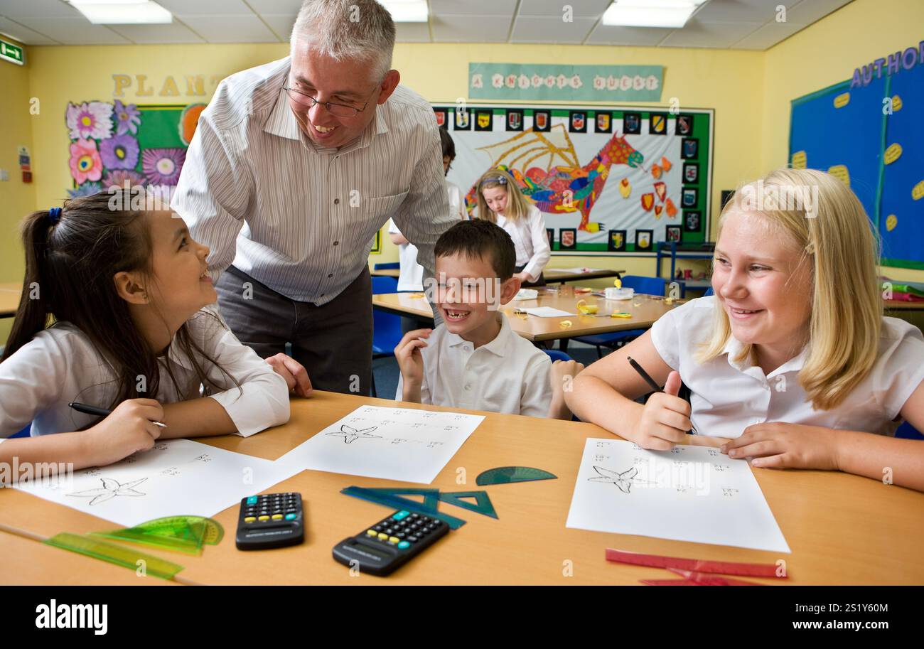 Junior School: Enjoying Maths. A group of young junior school children ...