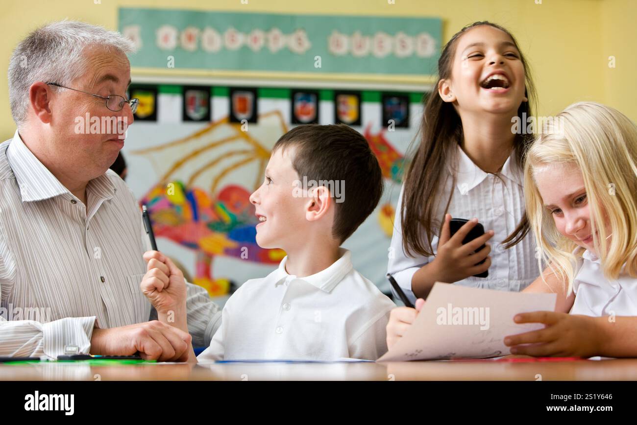 Junior School: Maths is Fun. Primary school pupils in a relaxed mood ...