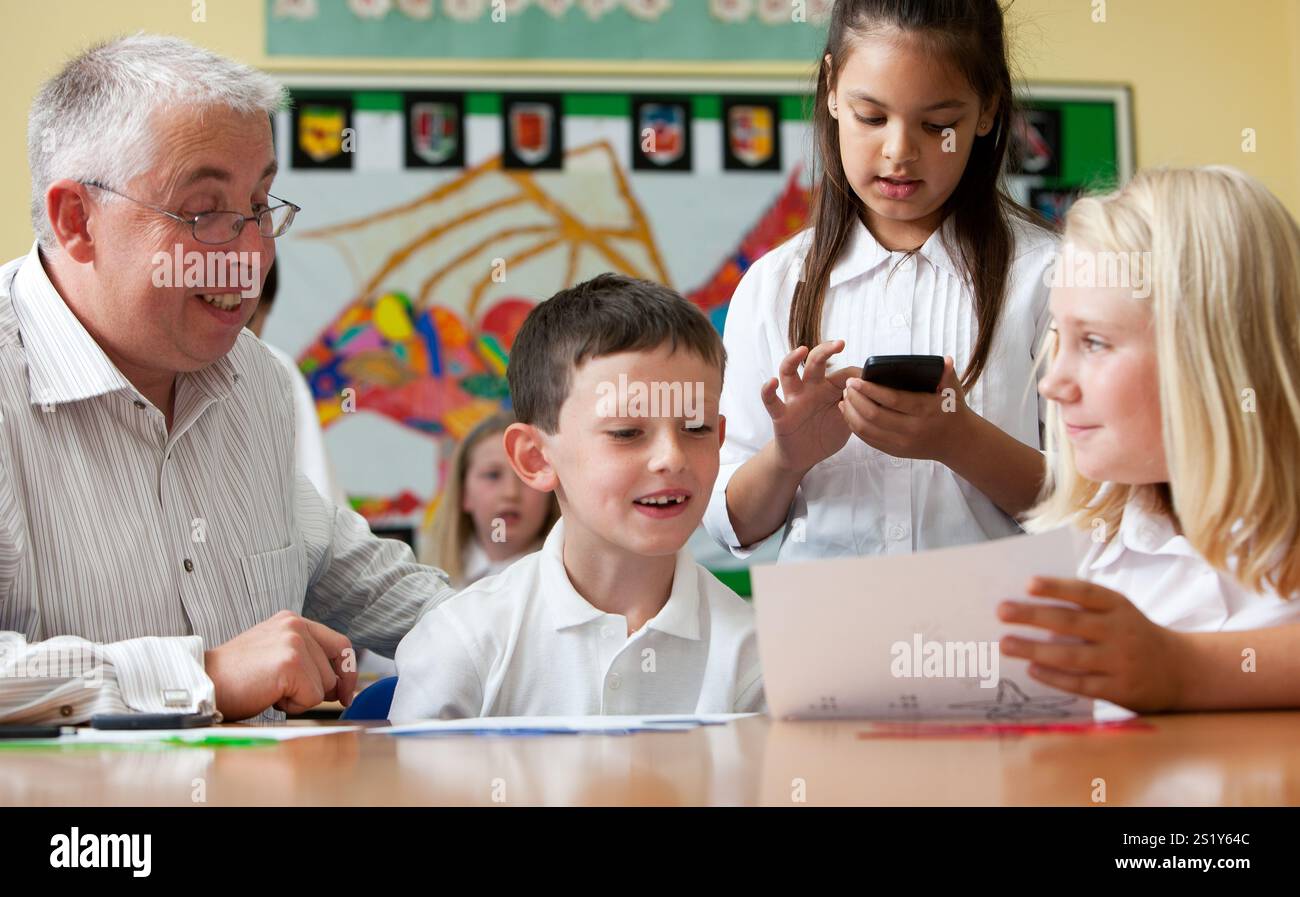 Junior School: Maths Solution. Primary school pupils in a relaxed and ...