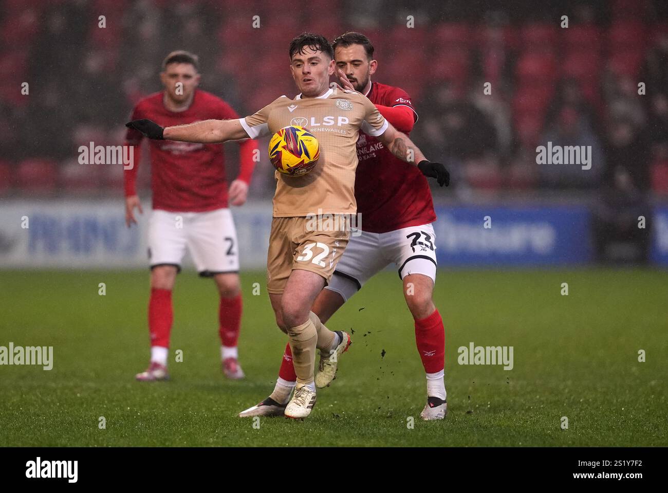 Crewe Alexandra's Jack Powell and Bromley's Ben Thompson (left) battle ...