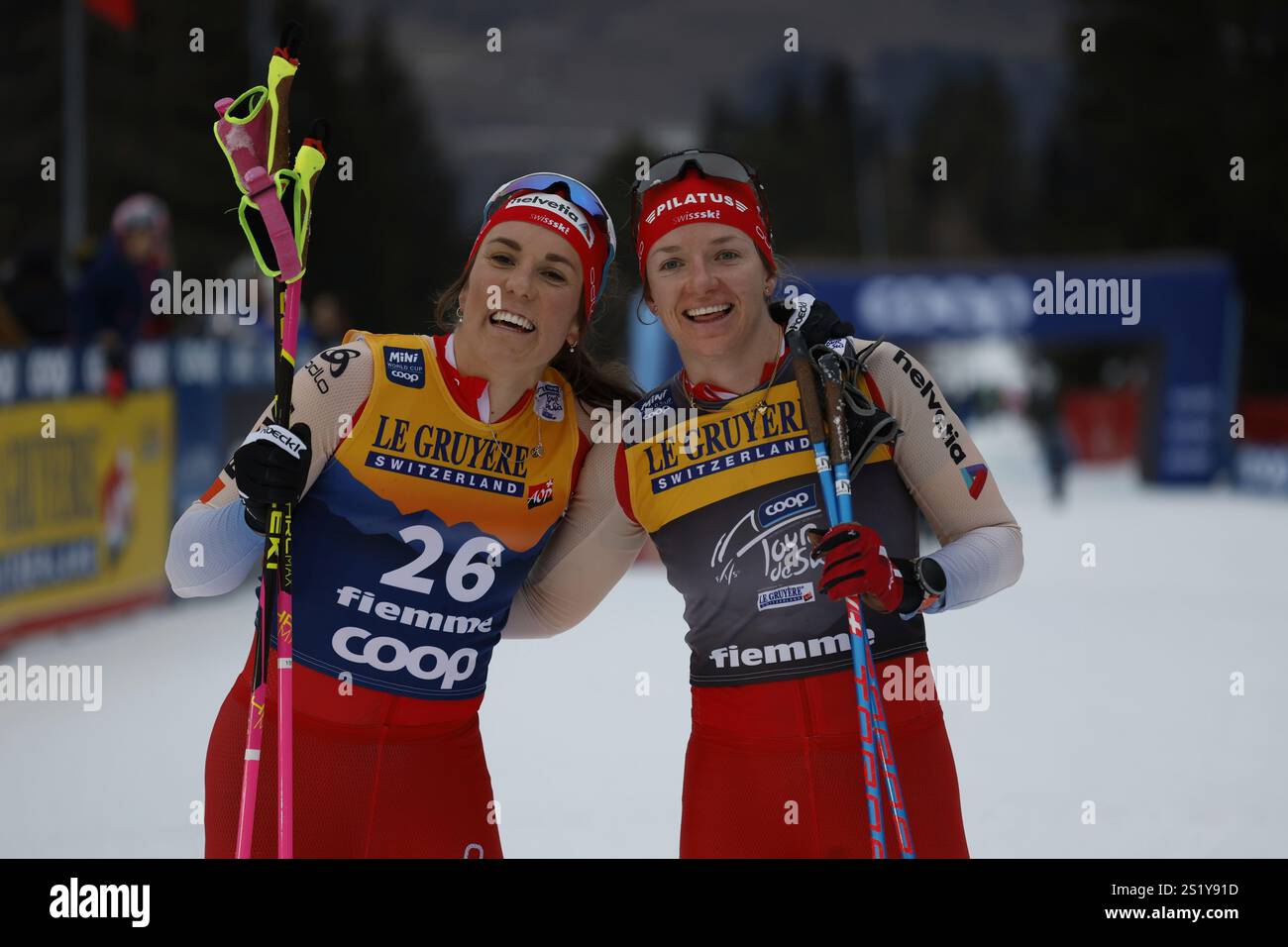 Switzerland's Anja Weber and Nadine Haehndrich celebrate after the 10km ...
