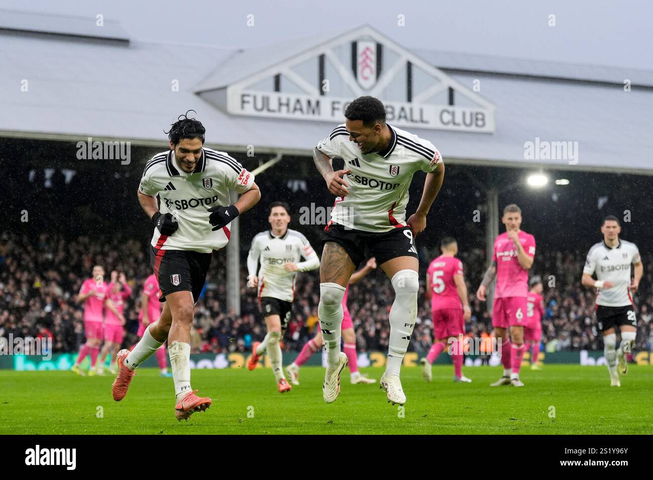 Fulham's Raul Jimenez (left) celebrates after scoring his sides first ...