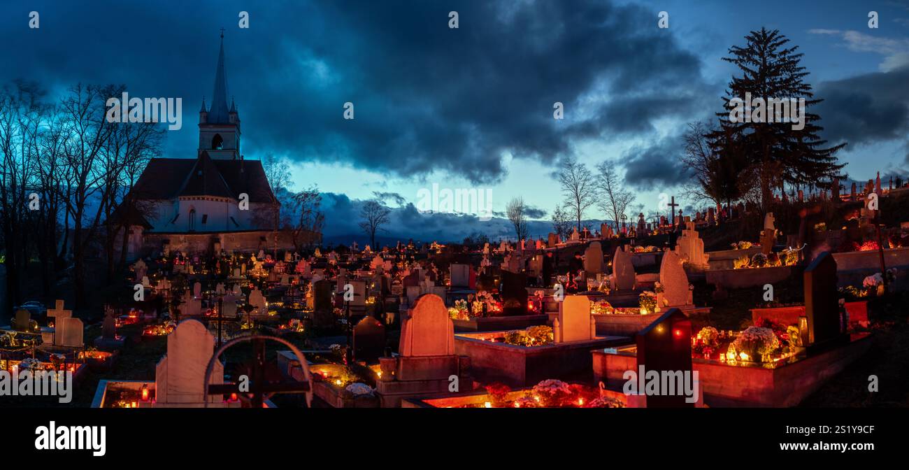 Night cemetery on All Saints' Day in Romania, Transylvania. Grave ...