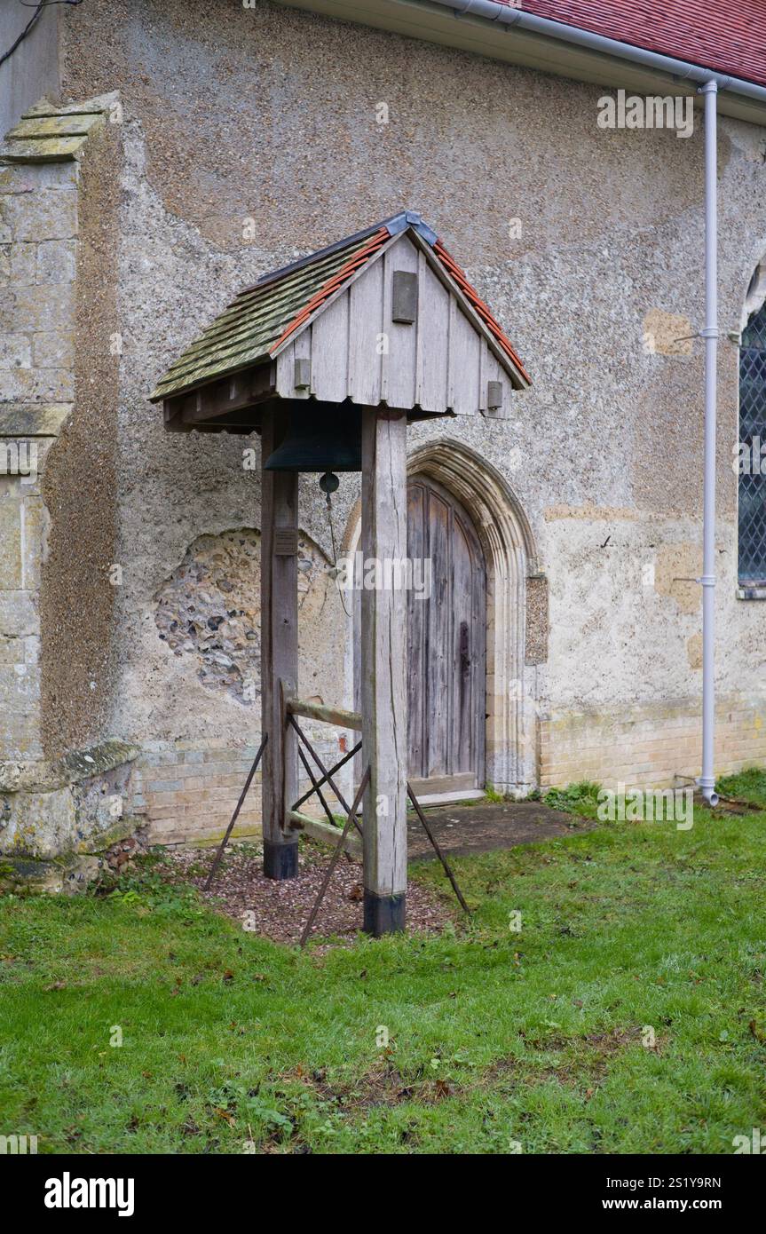 Church bell mounted on a frame outside the church of St Nicholas in ...