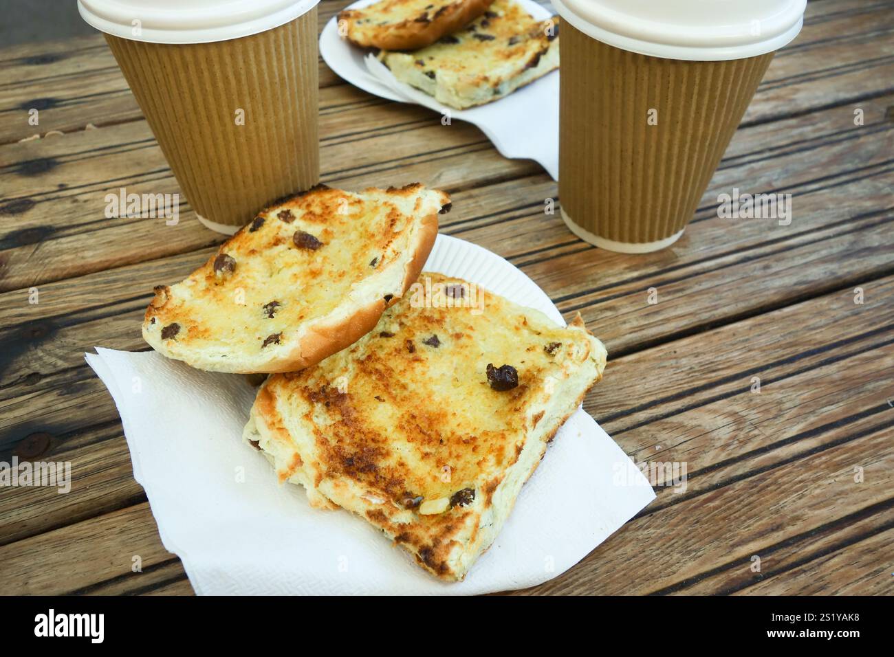 eating Toasted teacake and coffee outside in the uk Stock Photo - Alamy