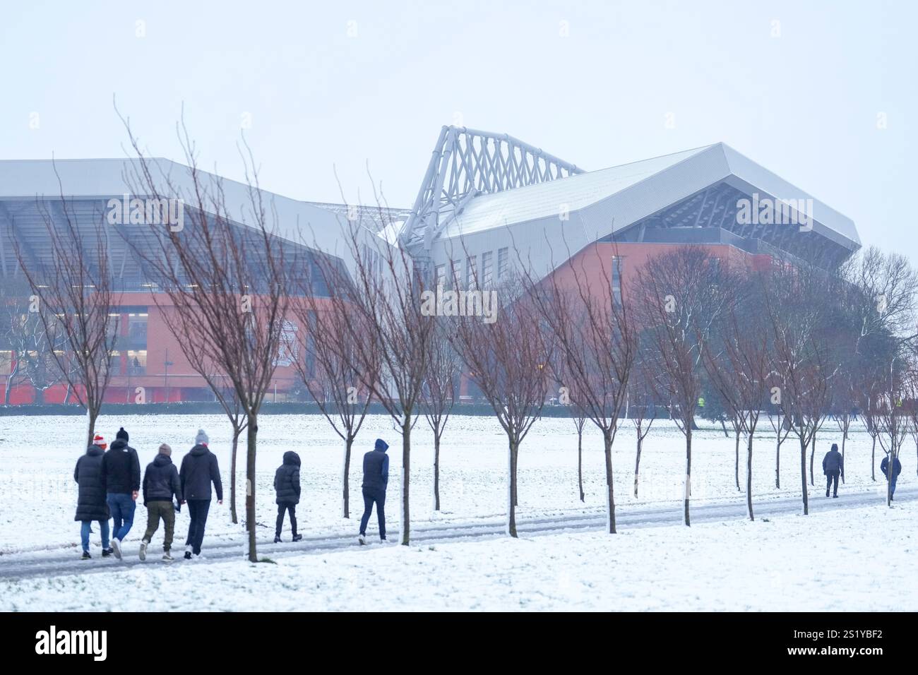 Fans arrive to Anfield stadium for a English Premier League soccer ...