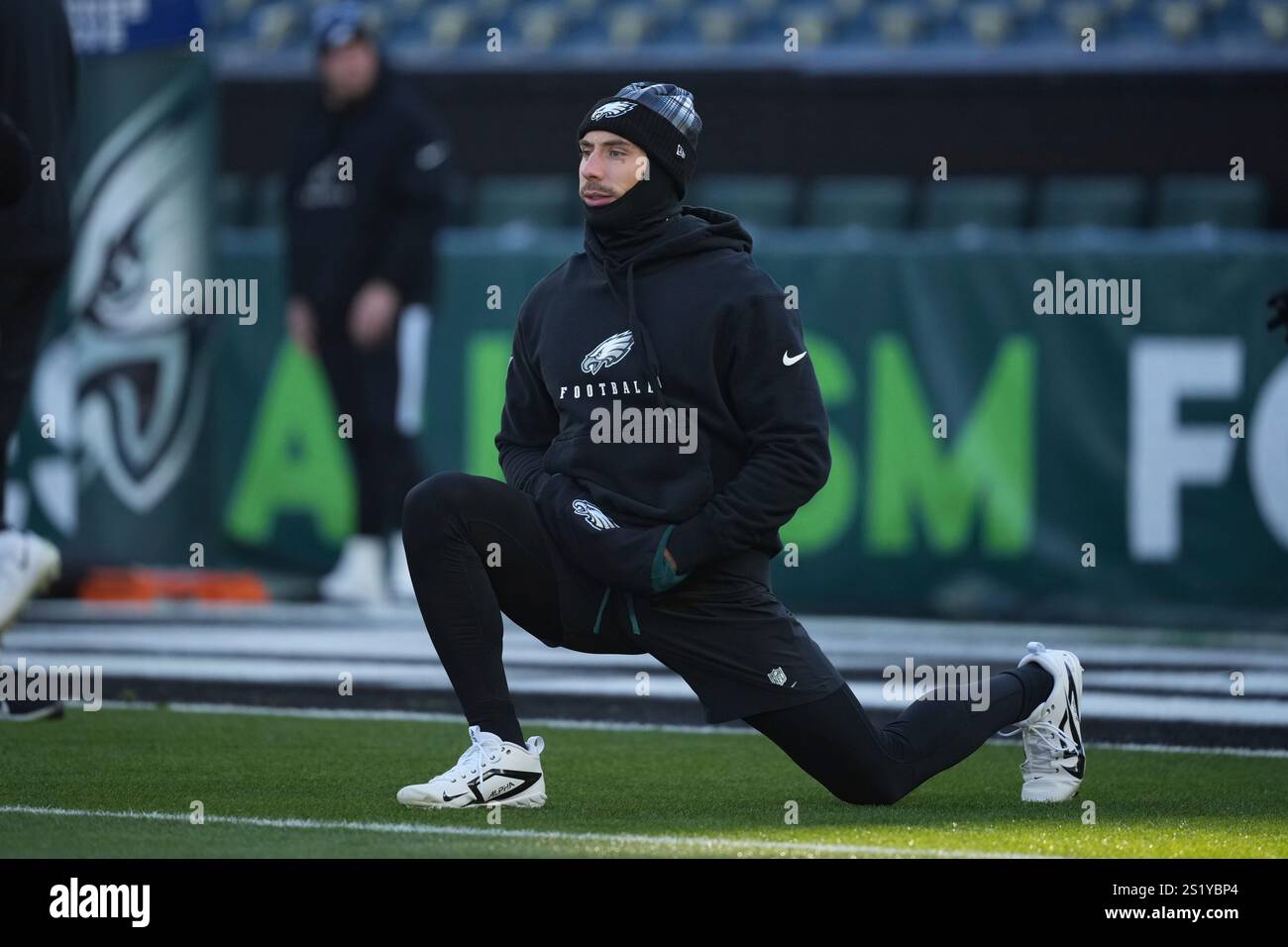 Philadelphia Eagles quarterback Ian Book (13) stretches before an NFL ...