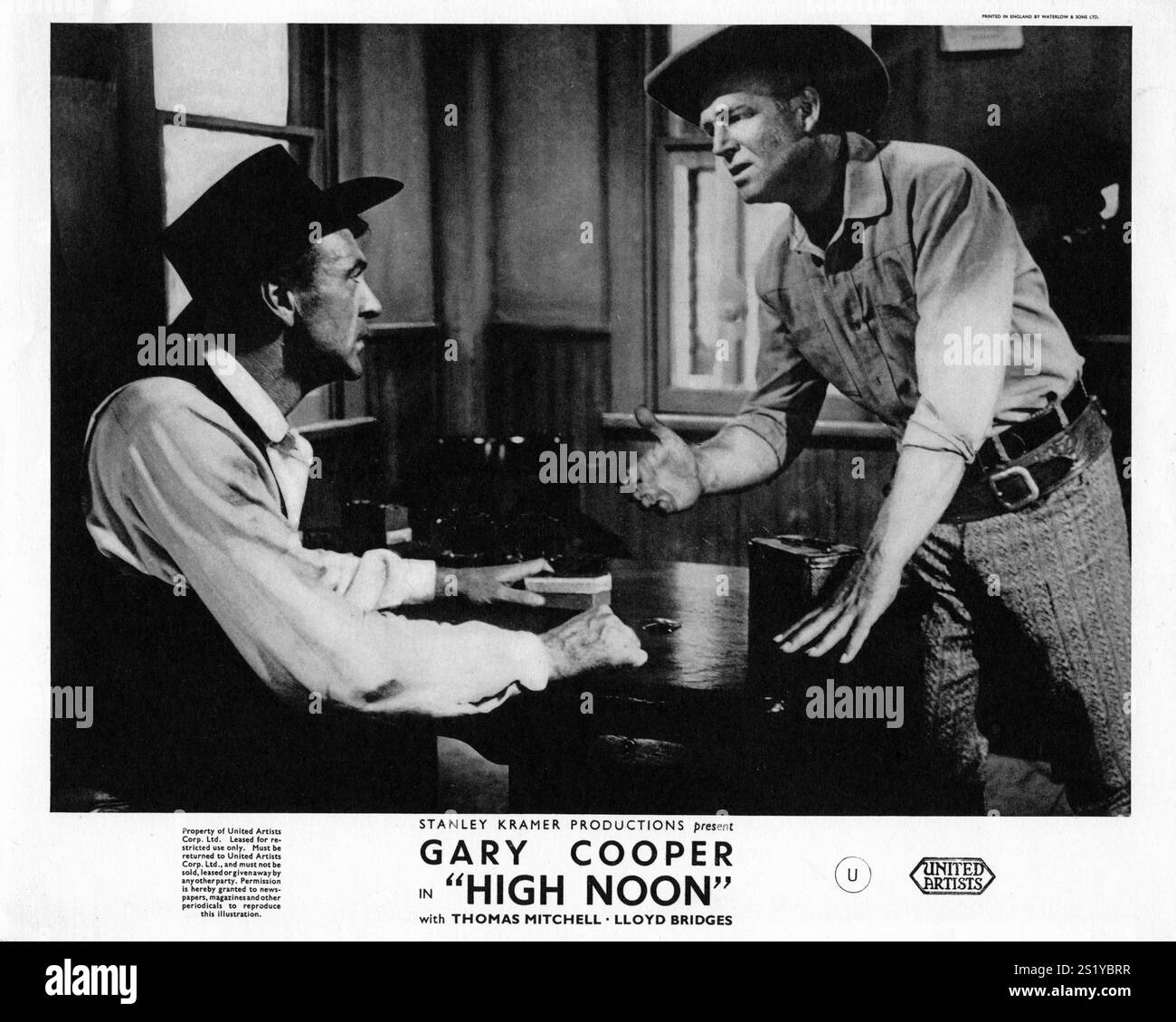 GARY COOPER and JAMES MILLICAN in a scene from HIGH NOON Director FRED ...