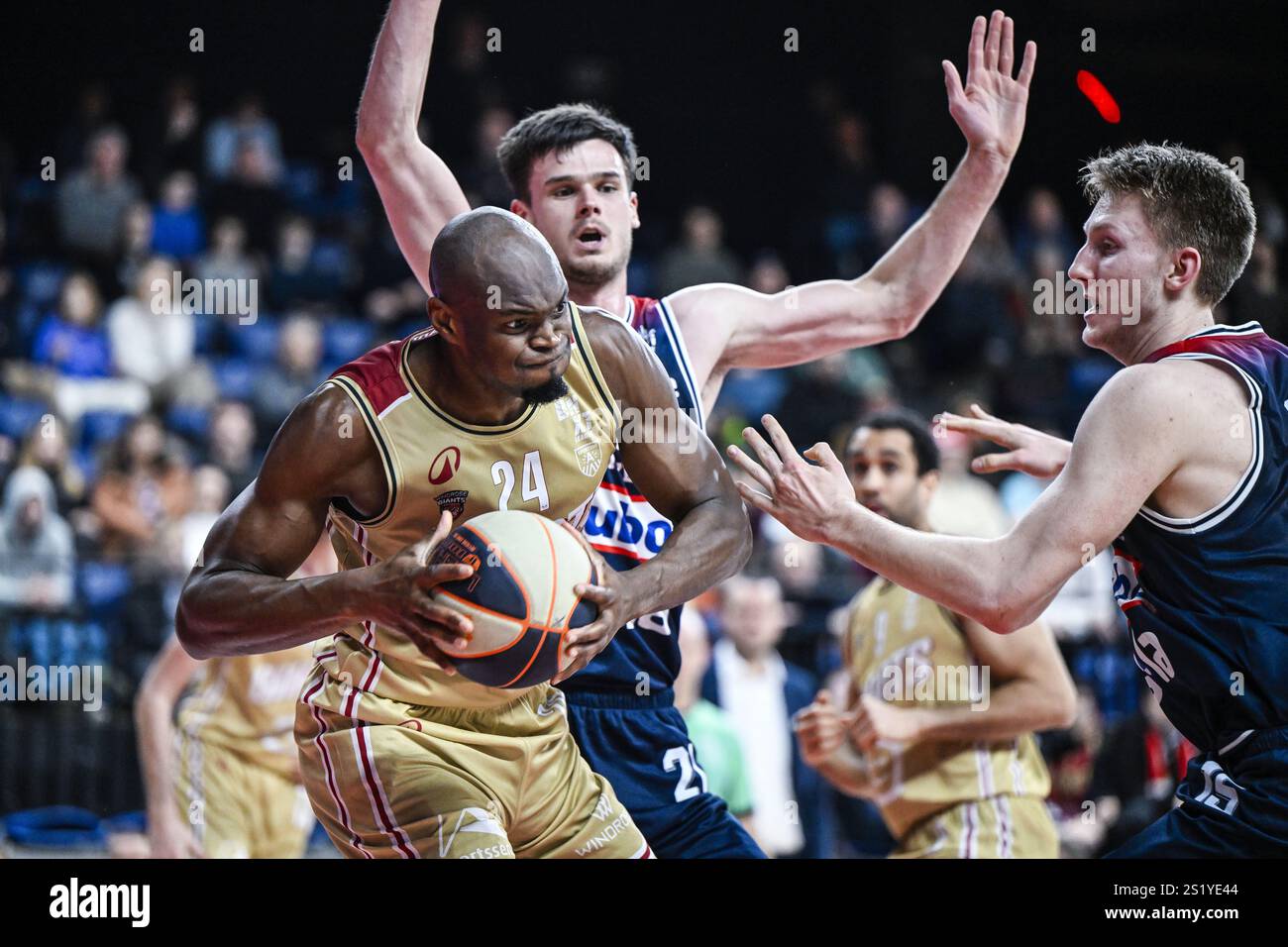 Antwerp's Kevin Tumba and Limburg's Oskar Giltay pictured in action ...