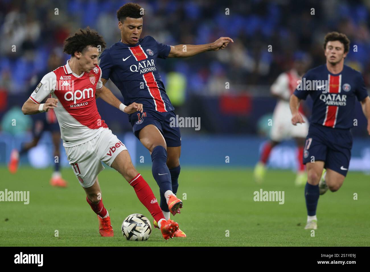 Monaco's Maghnes Akliouche, left, in action by PSG's Desire Doue during ...