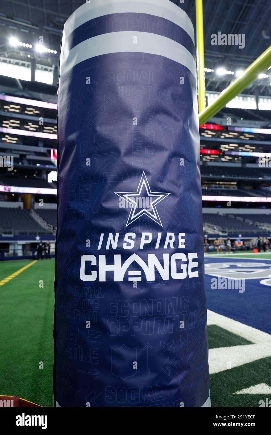 The goal post wrap at AT&T Stadium shows the NFL's "Inspire Change ...
