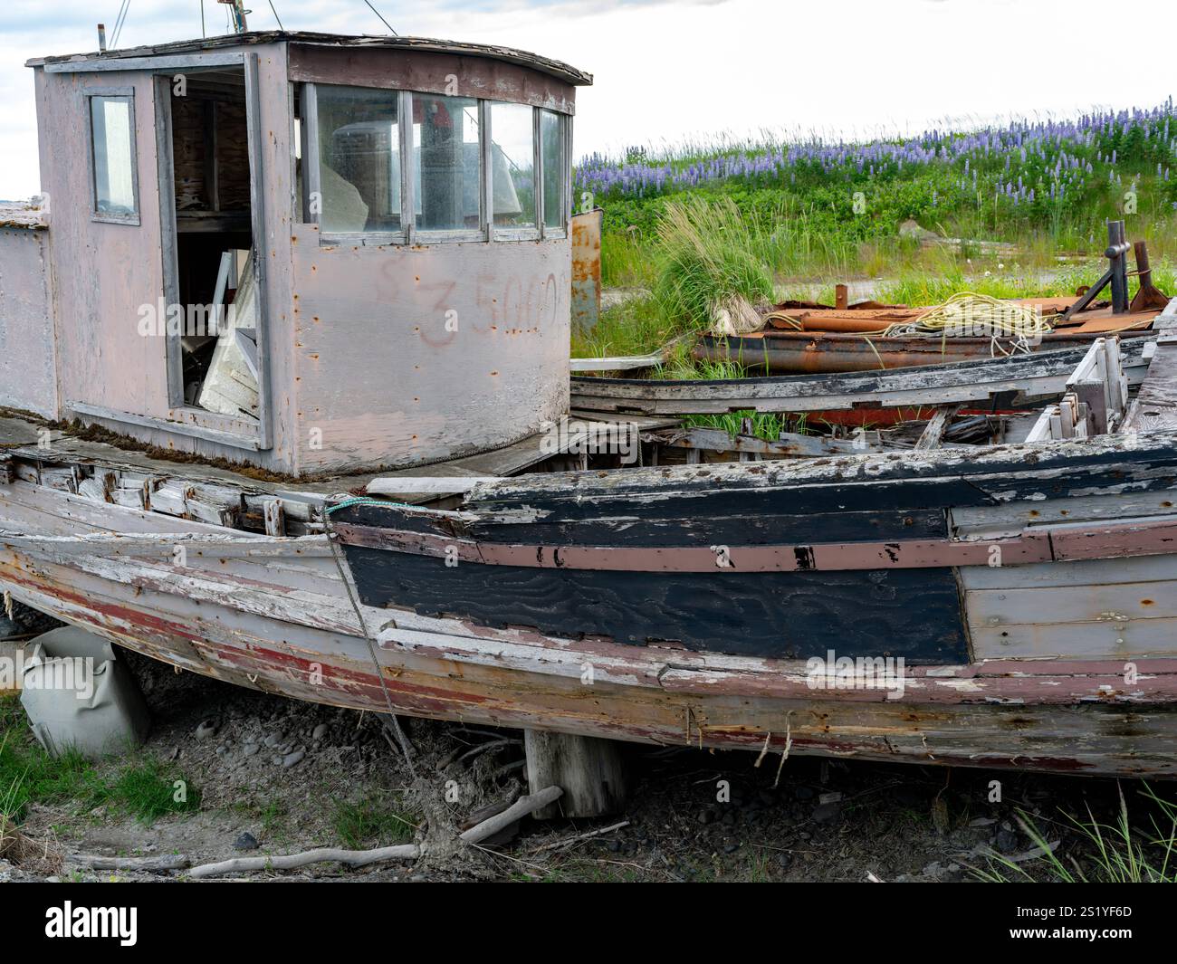 Ship on shore in bad shape for sale Stock Photo - Alamy