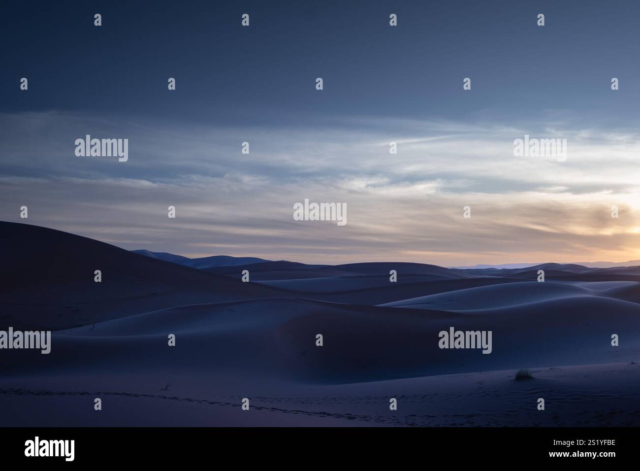 Beautiful panorama of the dusk in the Sahara desert in Morocco. The sun ...