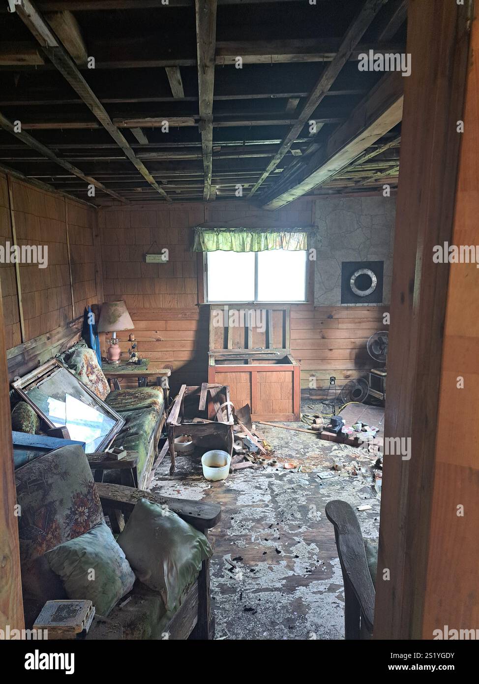 Living room inside abandoned dilapidated cabin in Pouch Cove ...