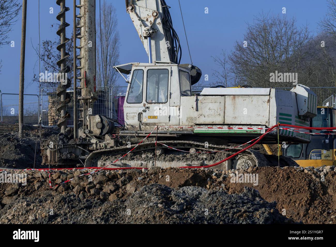 Nancy, France - View on an old white drilling rig Liebherr R 961 for special foundations on ...