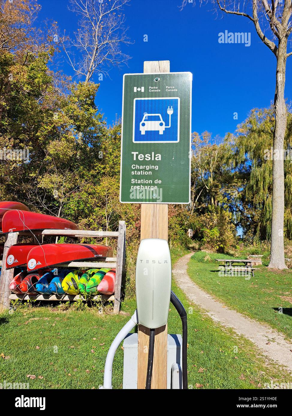 Tesla charging station sign at the Marsh Board Walk at Point Pelee ...