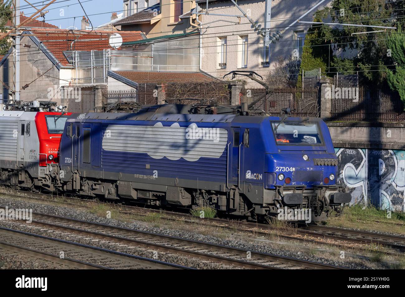 Nancy, France - View on a blue electric locomotive BB 27300 crossing Nancy station Stock Photo ...