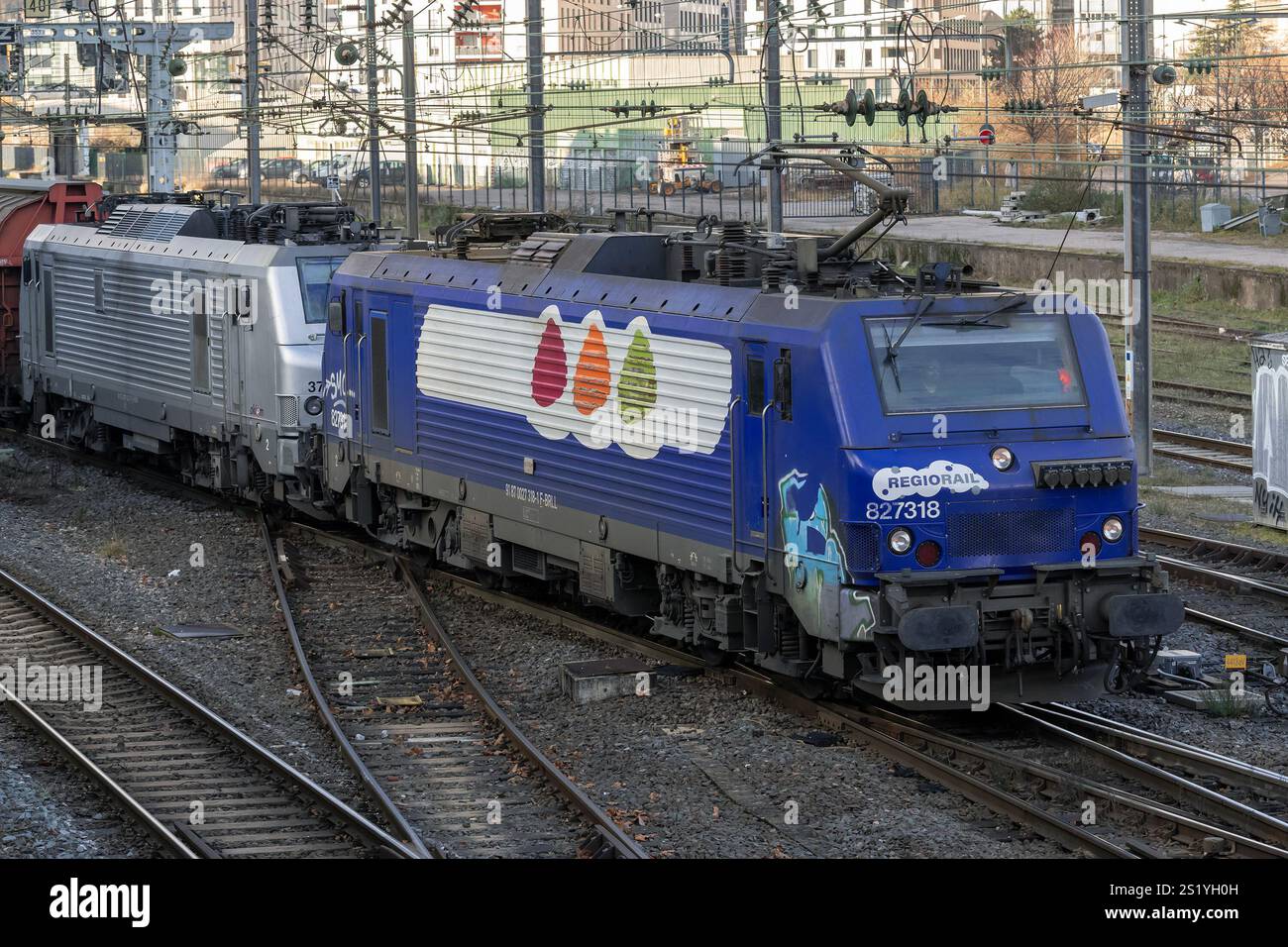 Nancy, France - View on a blue electric locomotive BB 27300 crossing Nancy station Stock Photo ...