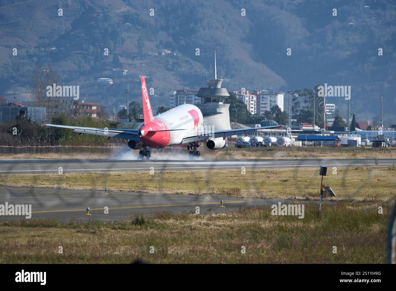 Red Wings aircraft landing at Batumi Airport. SSJ 100 landing at ...