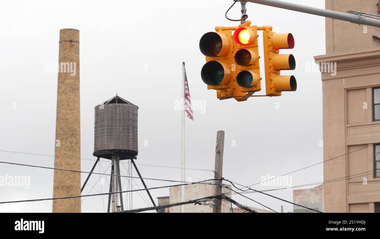 New York City street crossroad, yellow traffic light, transport road ...