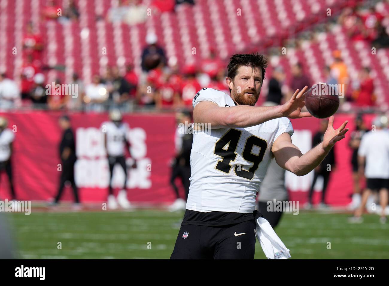 New Orleans Saints long snapper Zach Wood (49) warms up before an NFL ...