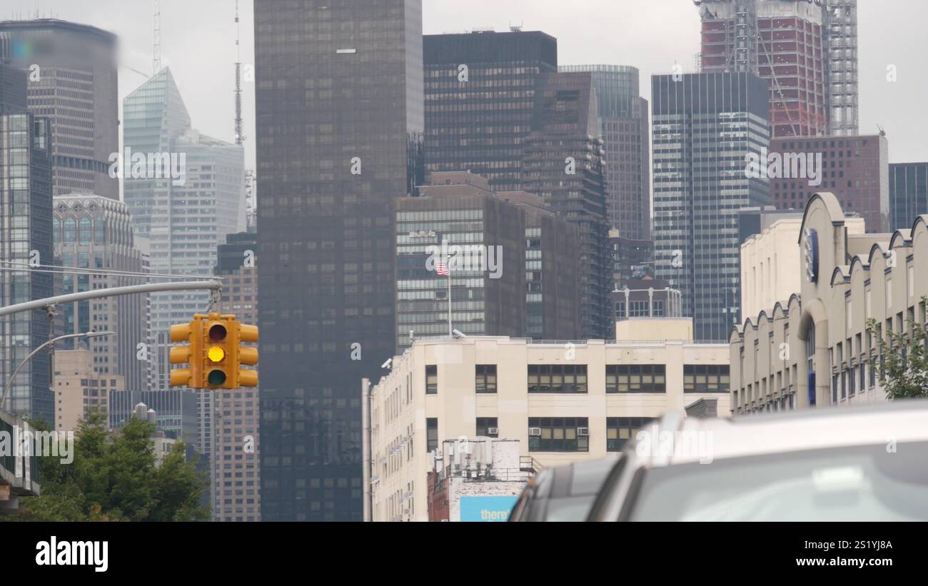 New York City street crossroad, yellow traffic light, transport road ...
