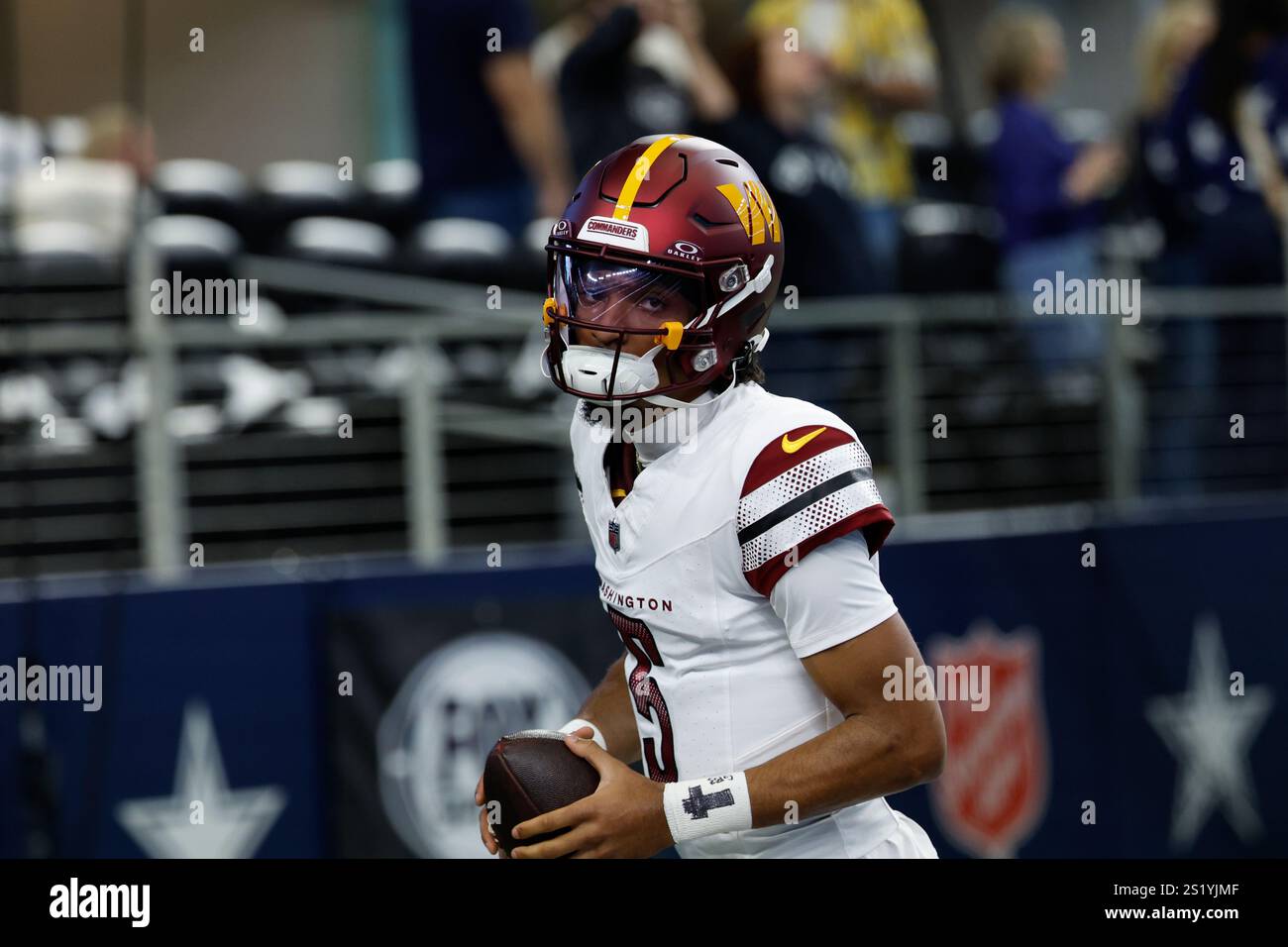 Washington Commanders quarterback Jayden Daniels (5) during pregame ...