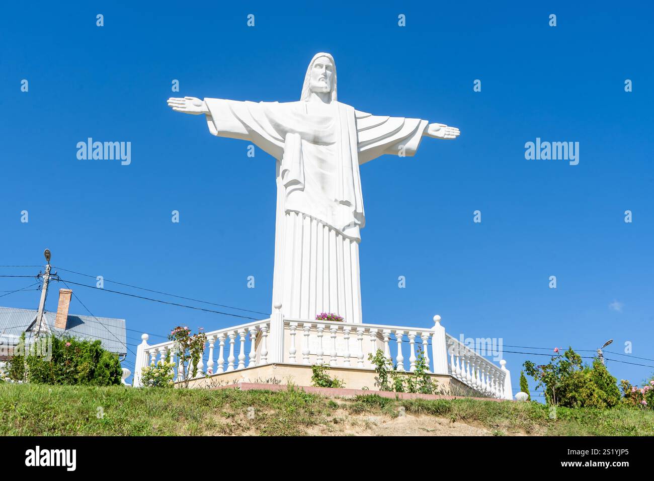 Statue of Jesus Christ hands against the blue sky. Ukraine, Truskavets ...