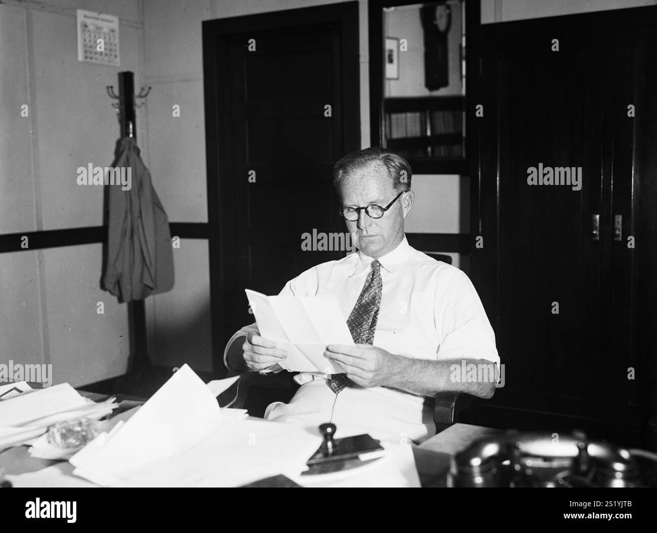 Joseph Kennedy working at his desk. Photo by Harris & Ewing - 1934 ...