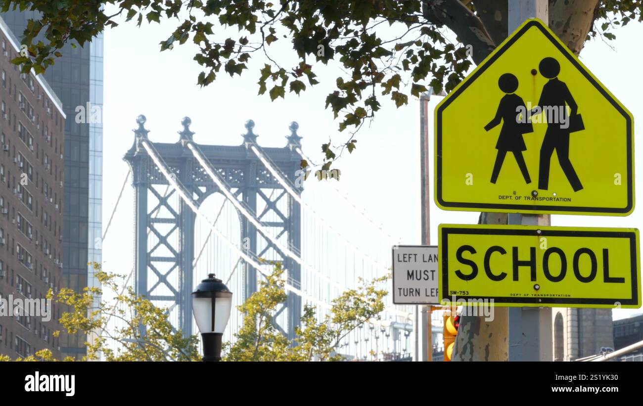 School zone yellow road sign, people crossing. Children safety on ...