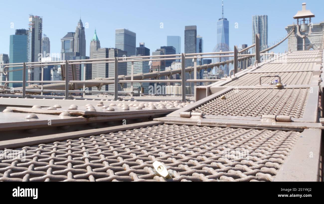 Brooklyn Bridge to Manhattan downtown. New York City skyline, financial ...