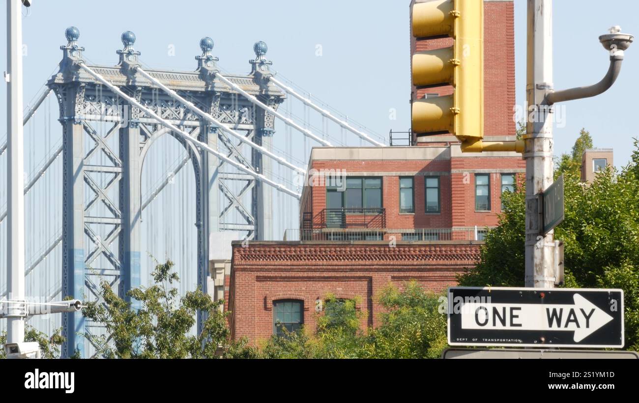 New York City Manhattan Bridge view from Brooklyn Bridge. Red brown ...