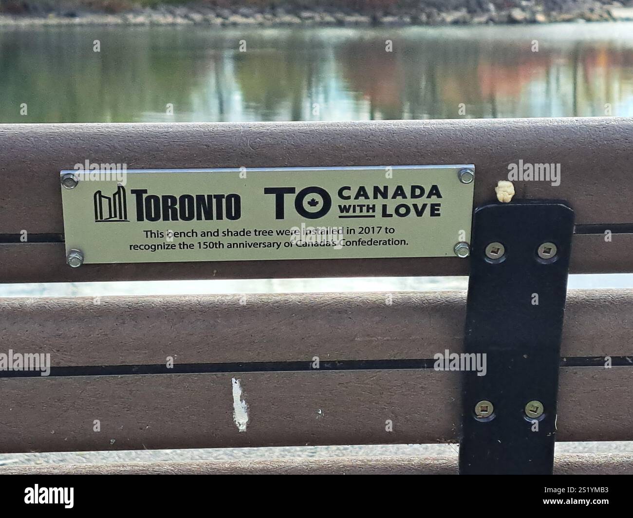Canada confederation 150 anniversary sign on a bench at Bluffer's Park ...