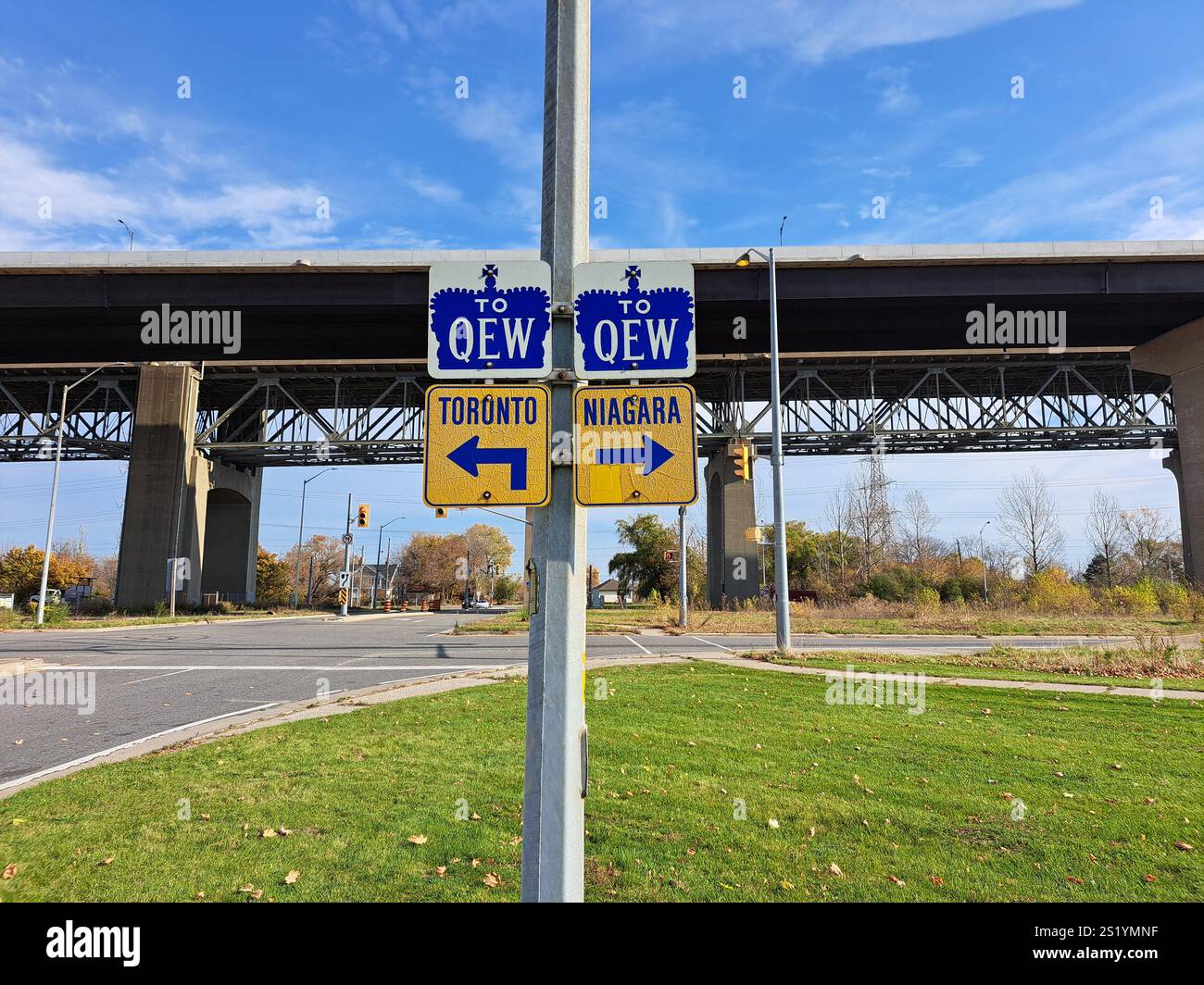 Directional QEW signs to Toronto and Niagara on Lakeshore Road in ...