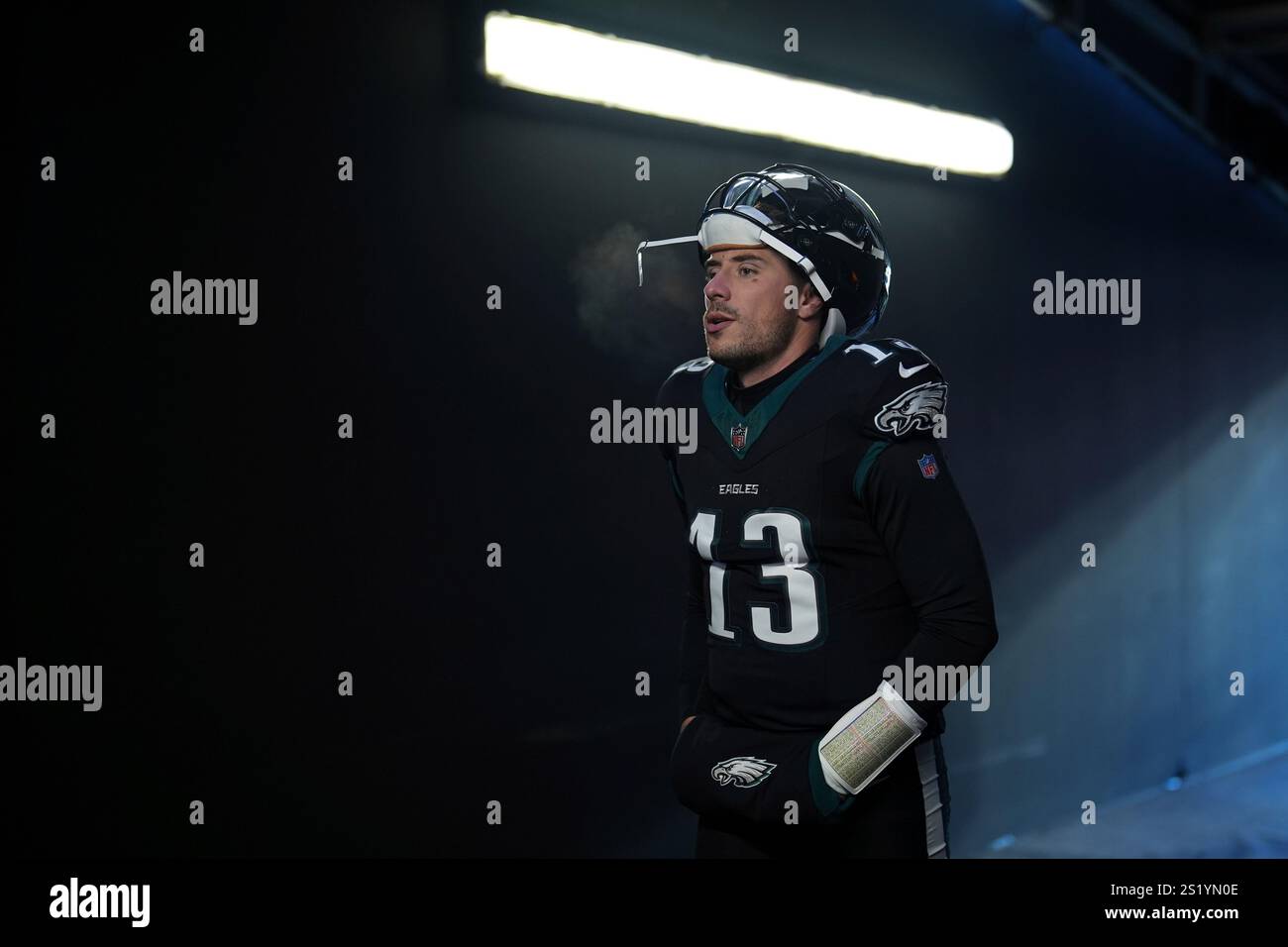 Philadelphia Eagles quarterback Ian Book (13) walks in the tunnel ...