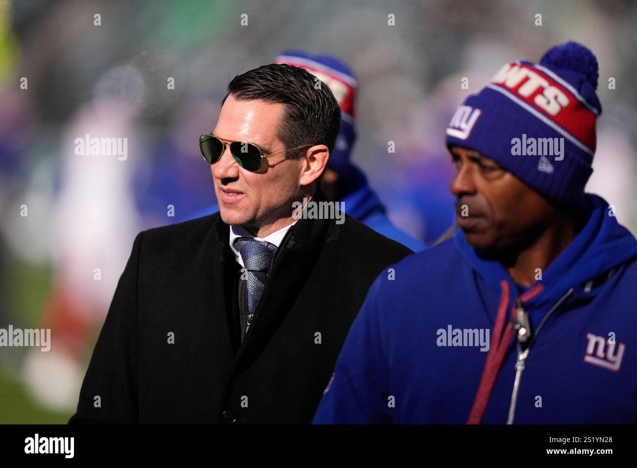 New York Giants general manager Joe Schoen watches warm ups before an ...