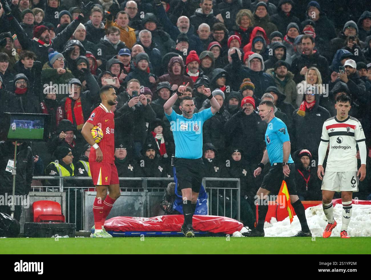 Referee Michael Oliver signals for a VAR check during the Premier ...