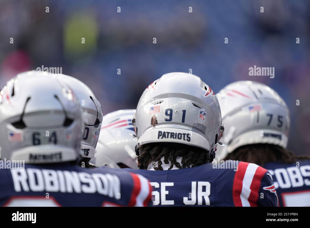 New England Patriots defensive end Deatrich Wise Jr. walks on the field ...