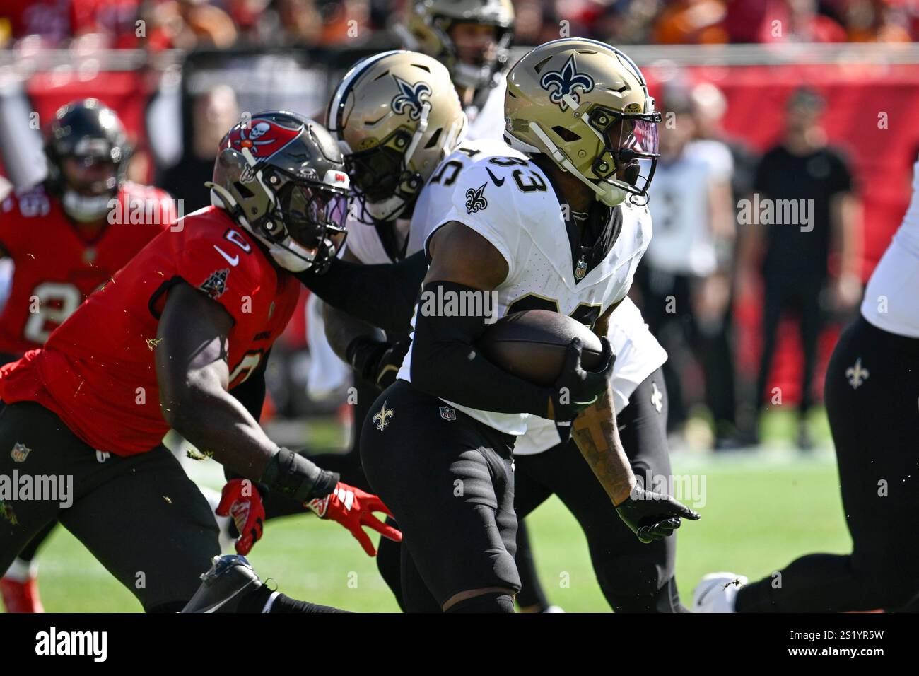 New Orleans Saints running back Jordan Mims (33) carries off a direct ...