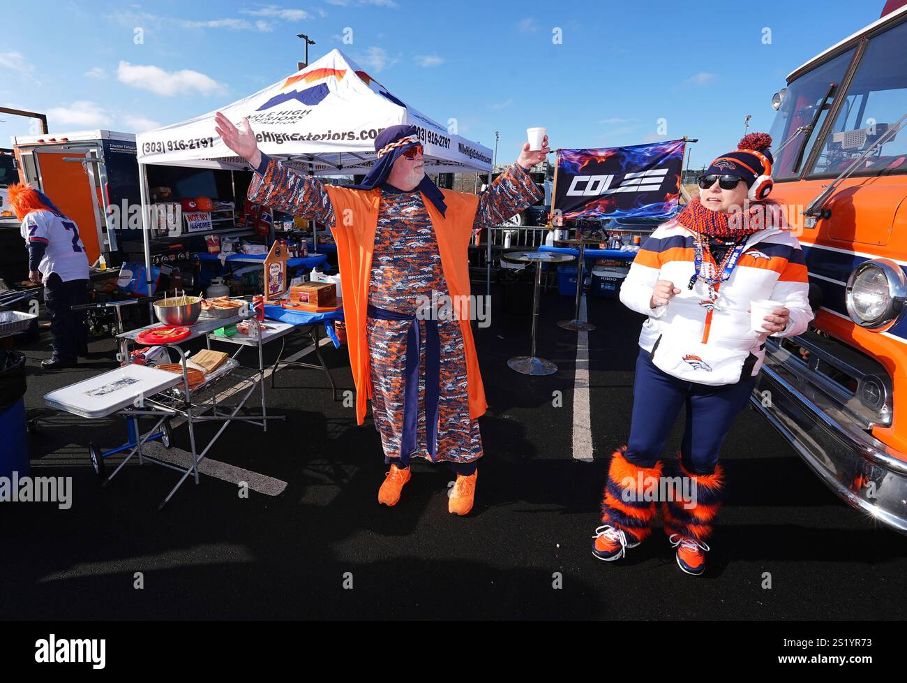 Denver Broncos fan John Buckley, the Mile High Prophet, greets fans in ...