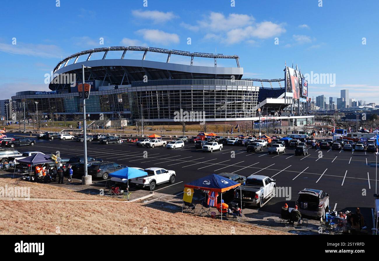 Fans start to fill in a parking lot outside Empower Field at Mile High ...
