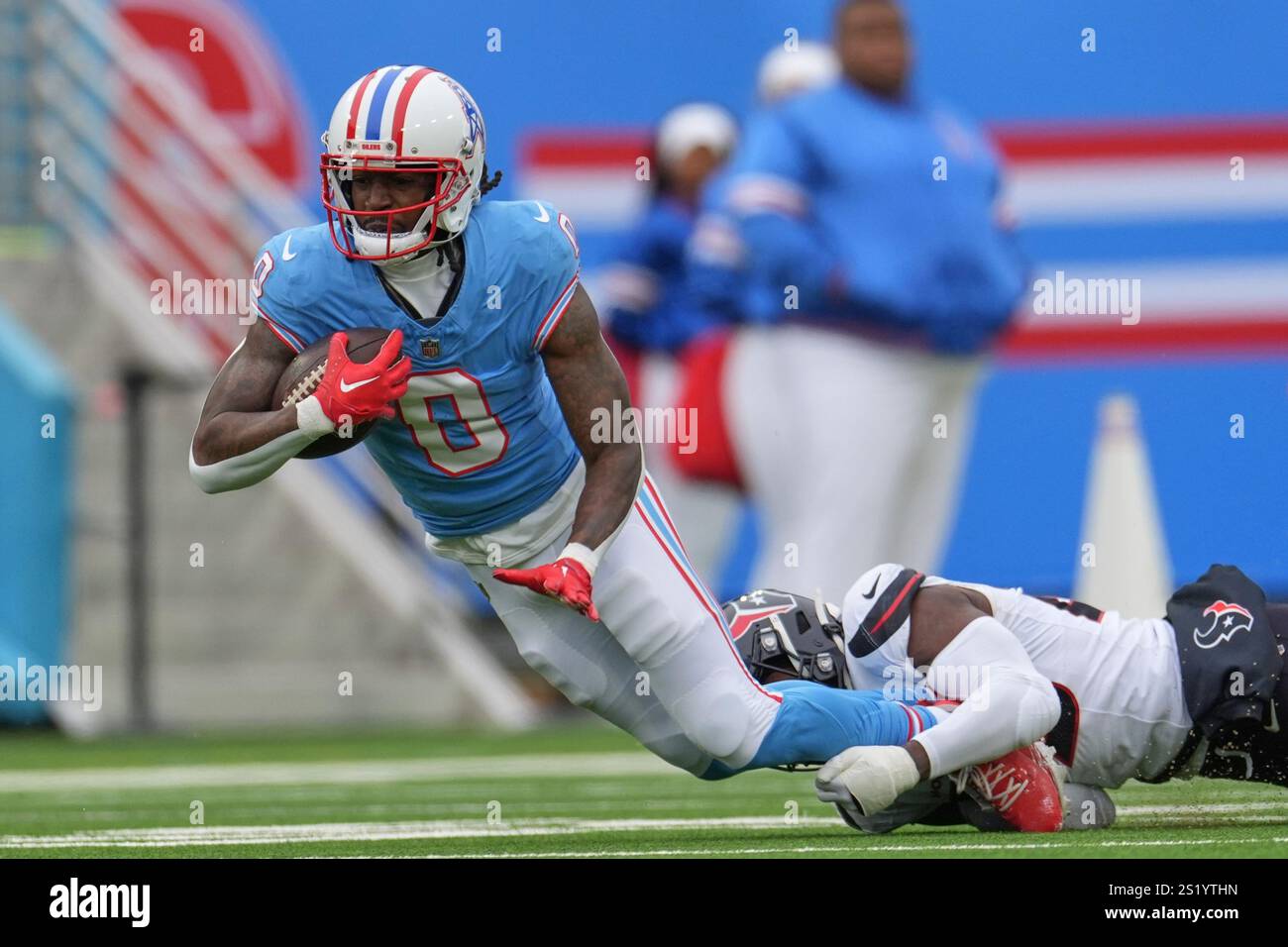 Tennessee Titans wide receiver Calvin Ridley (0) is tackled by Houston ...