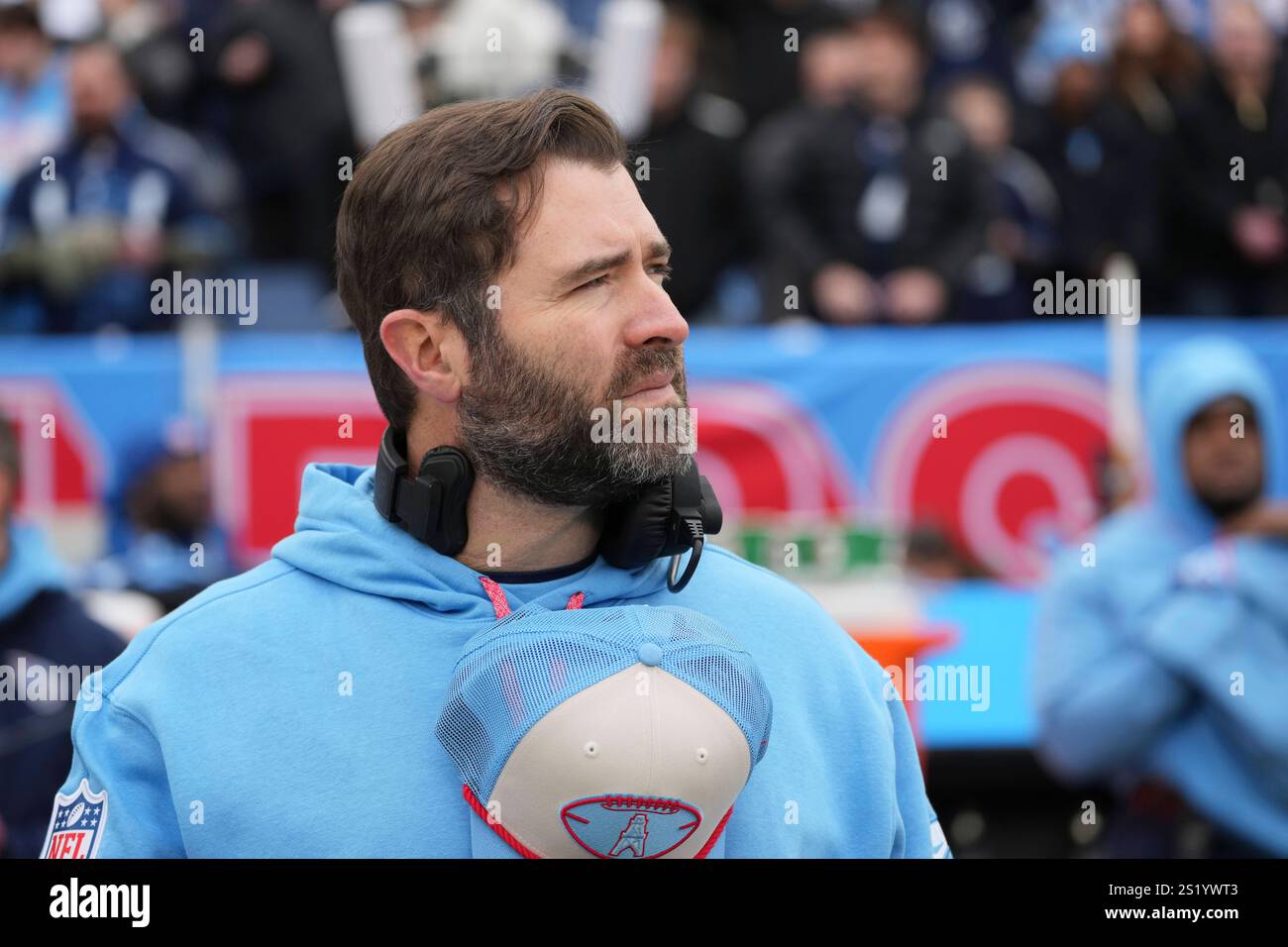Tennessee Titans coach Brian Callahan listens to the national anthem ...