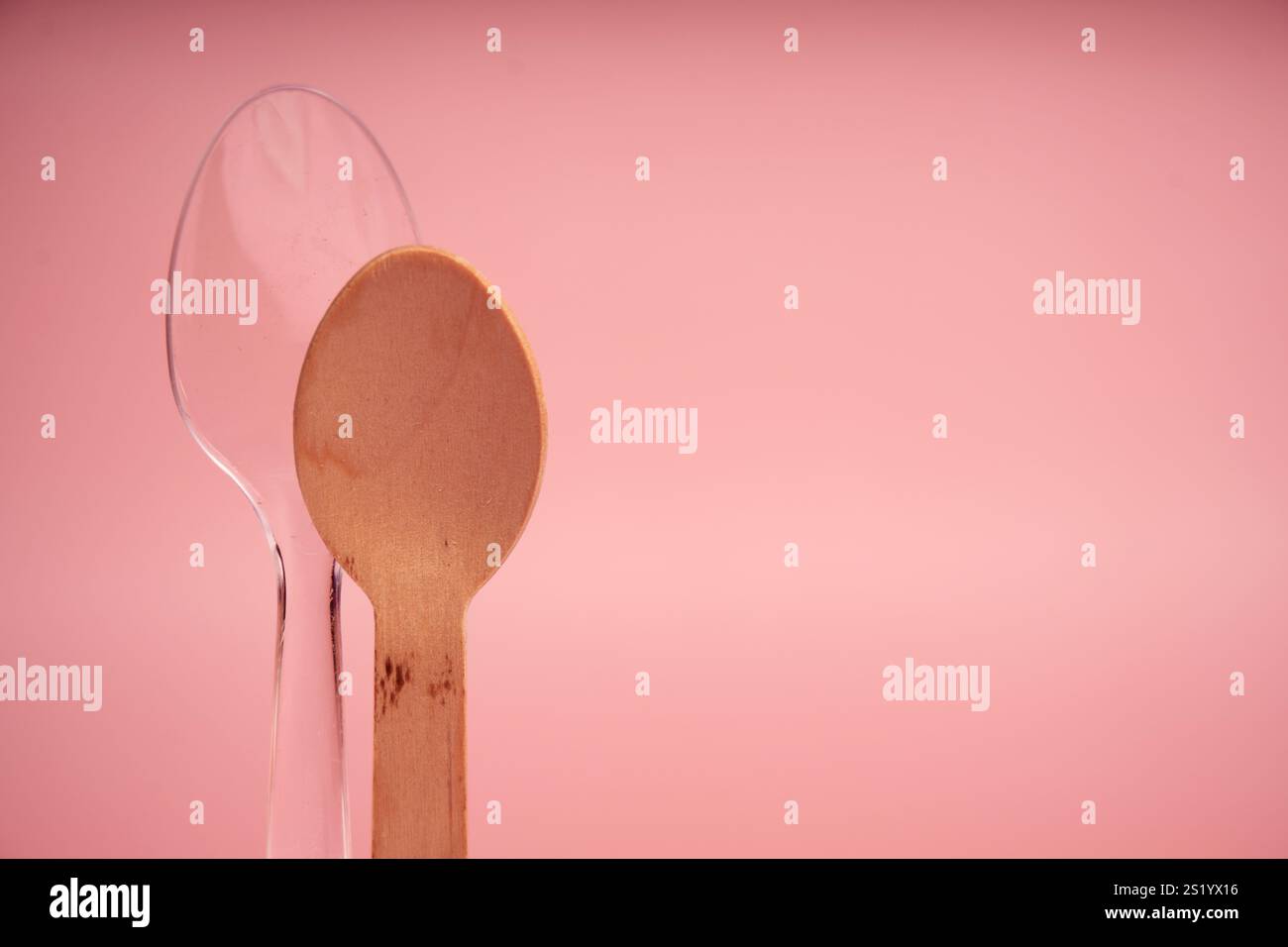 disposable plastic and wood spoons Stock Photo - Alamy